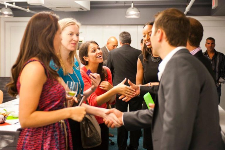 People at a networking event | Peter Deth